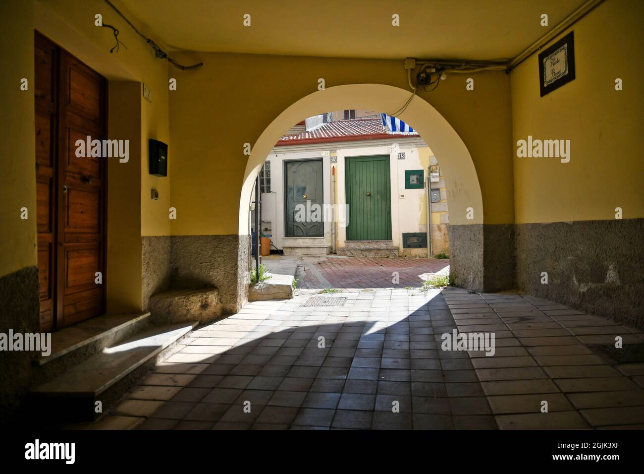 A narrow street in Oliveto Citra, an old town in the province of ...