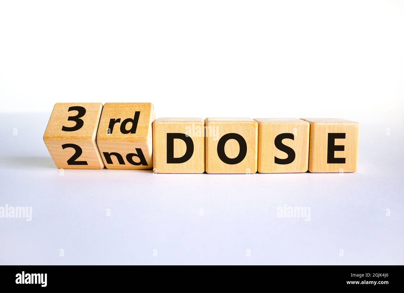 Covid-19 booster dose vaccine shot symbol. Turned cubes and changed ...