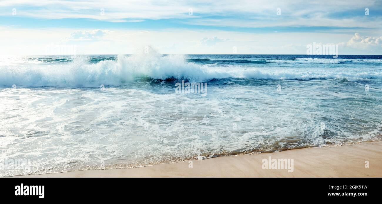 Ocean waves and blue sky Stock Photo - Alamy