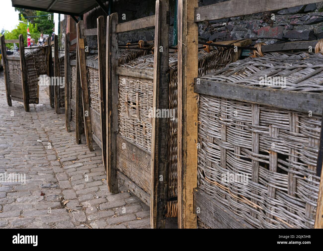 Wicker baskets used to descend the streets of the upper area of the ...