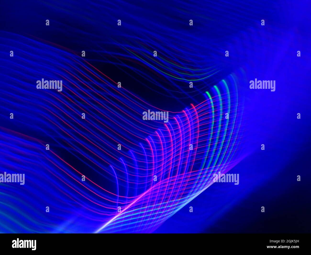 Neon abstract light trails background Stock Photo - Alamy