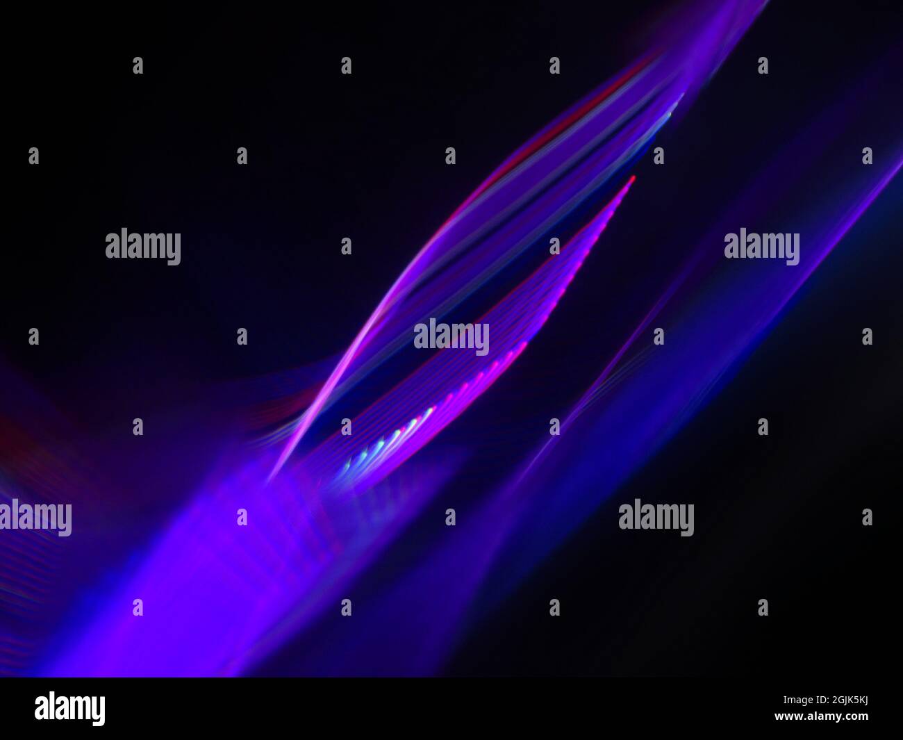 Neon abstract light trails background Stock Photo - Alamy