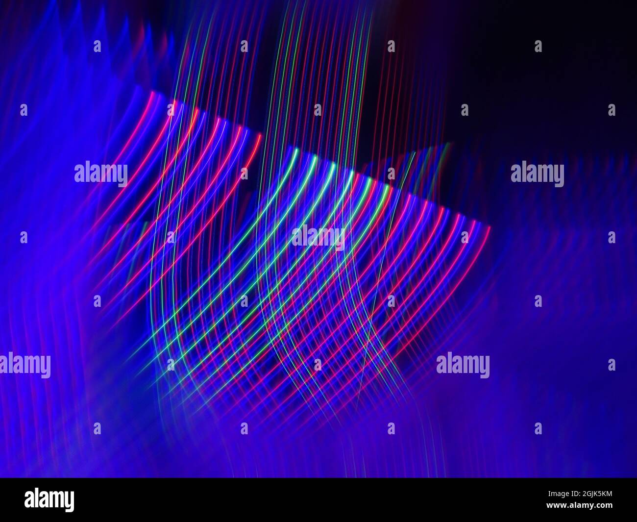 Neon abstract light trails background Stock Photo - Alamy