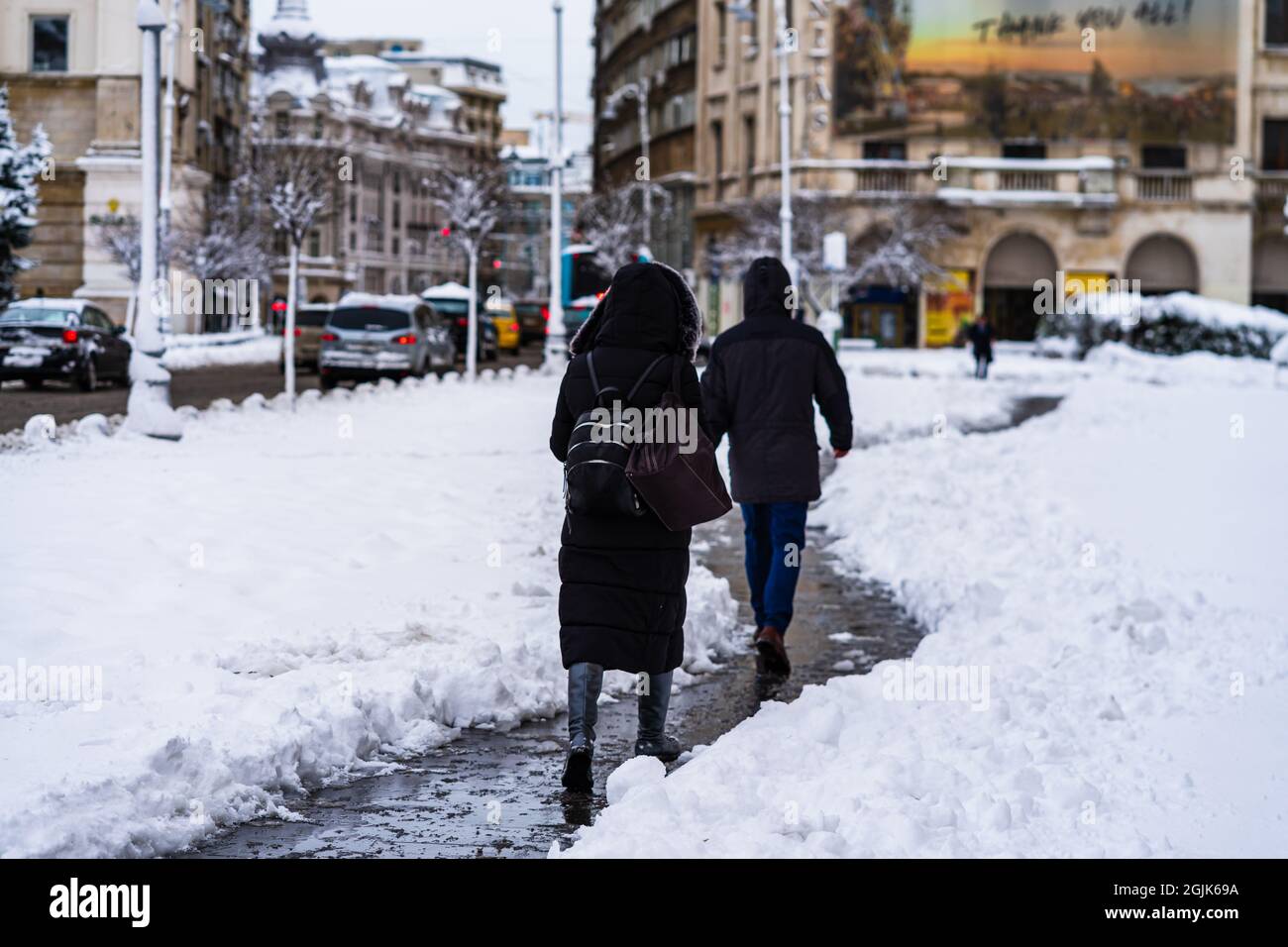 Walking on snowy trail in Bucharest, Romania, 2021. Snow on streets ...