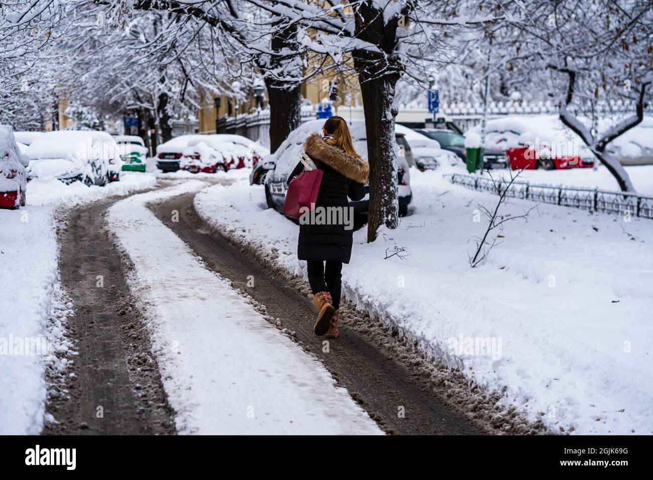 Walking on snowy trail in Bucharest, Romania, 2021. Snow on streets ...