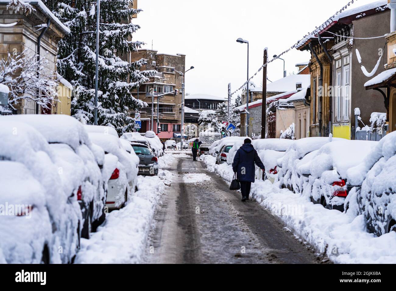 Walking on snowy trail in Bucharest, Romania, 2021. Snow on streets ...