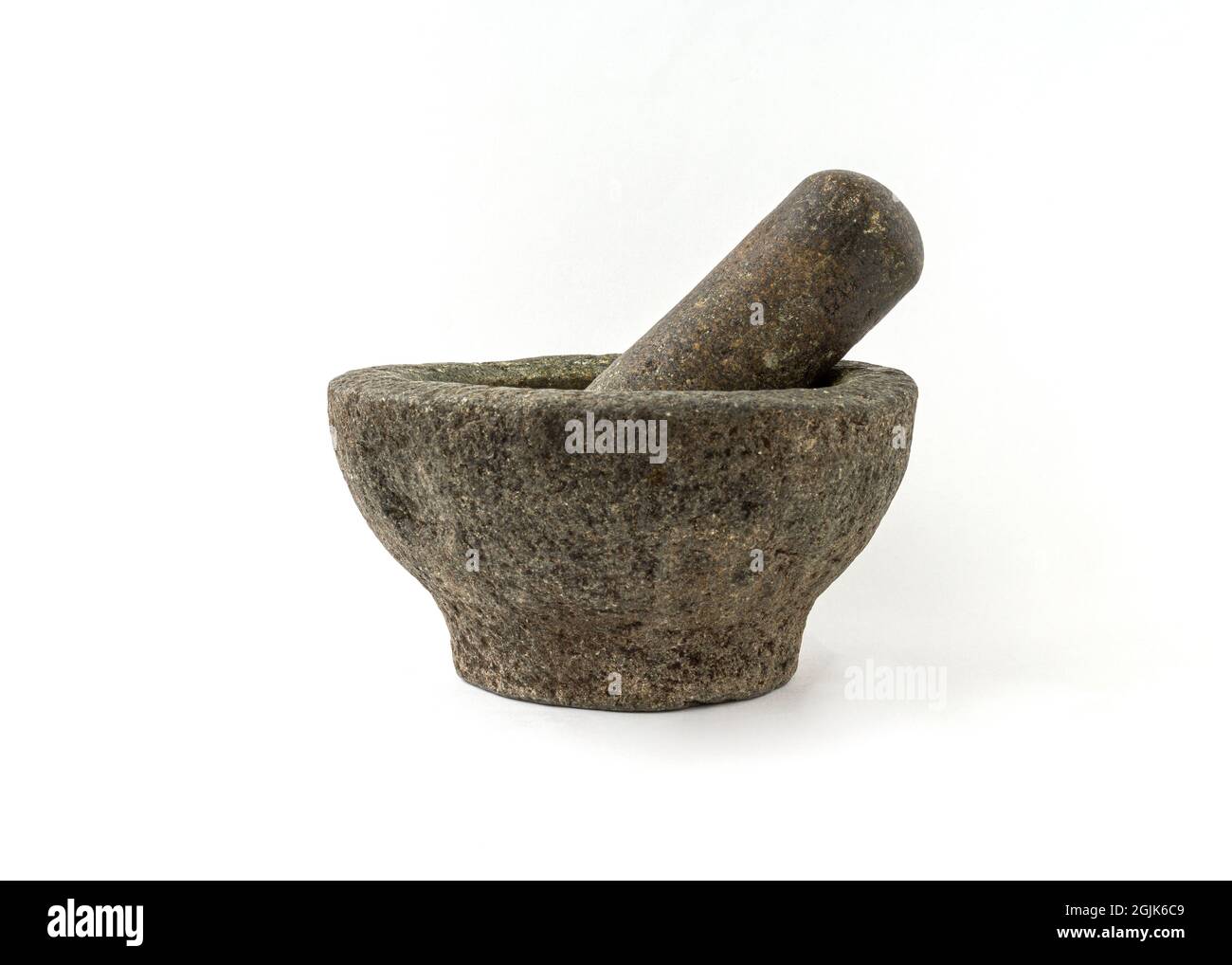 Old granite pestle and mortar isolated on white background Stock Photo ...