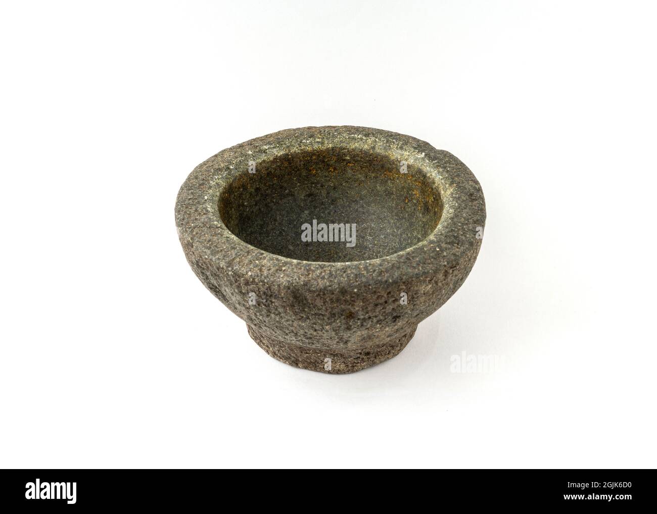 Old granite pestle and mortar isolated on white background Stock Photo ...