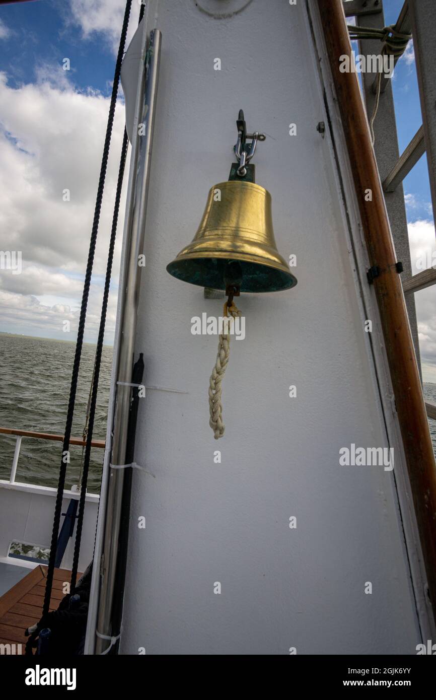 Vertical shot of the bell on the sailboat Stock Photo - Alamy