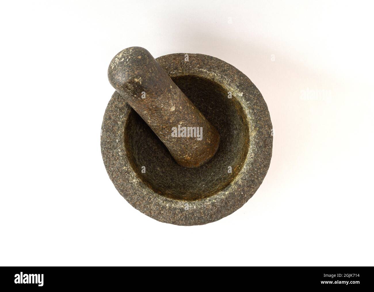 Old granite pestle and mortar isolated on white background Stock Photo ...