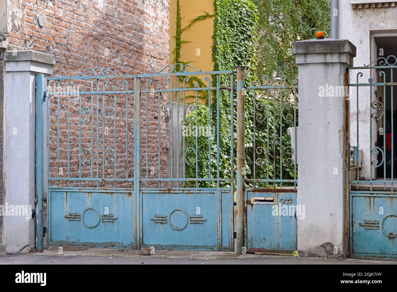Closed Metal Gate at Old House Entrance Stock Photo - Alamy
