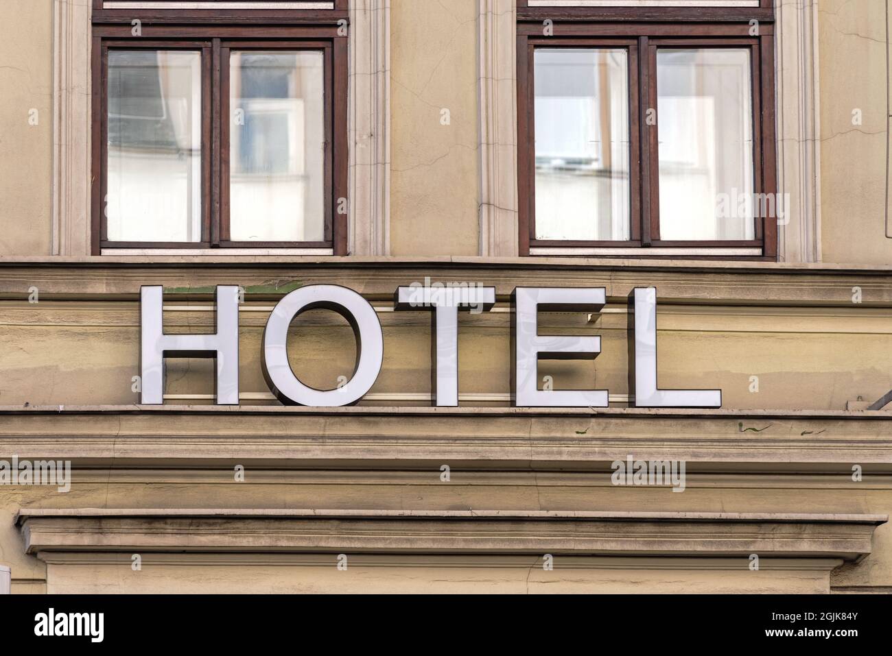 Hotel Sign at Building White English Letters Stock Photo - Alamy