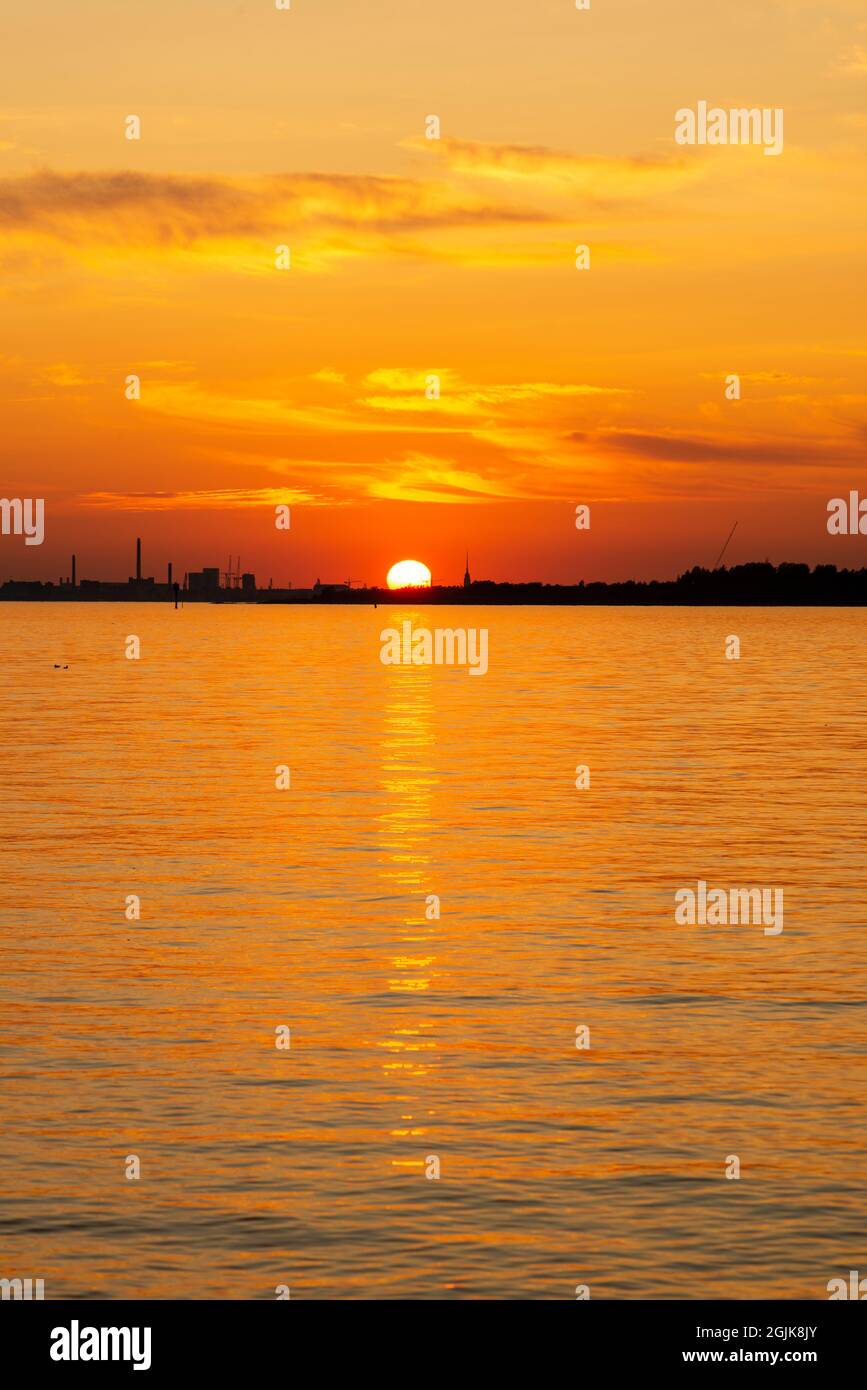 Sunset at Isosaari island (Helsinki area) looking towards the mainland ...
