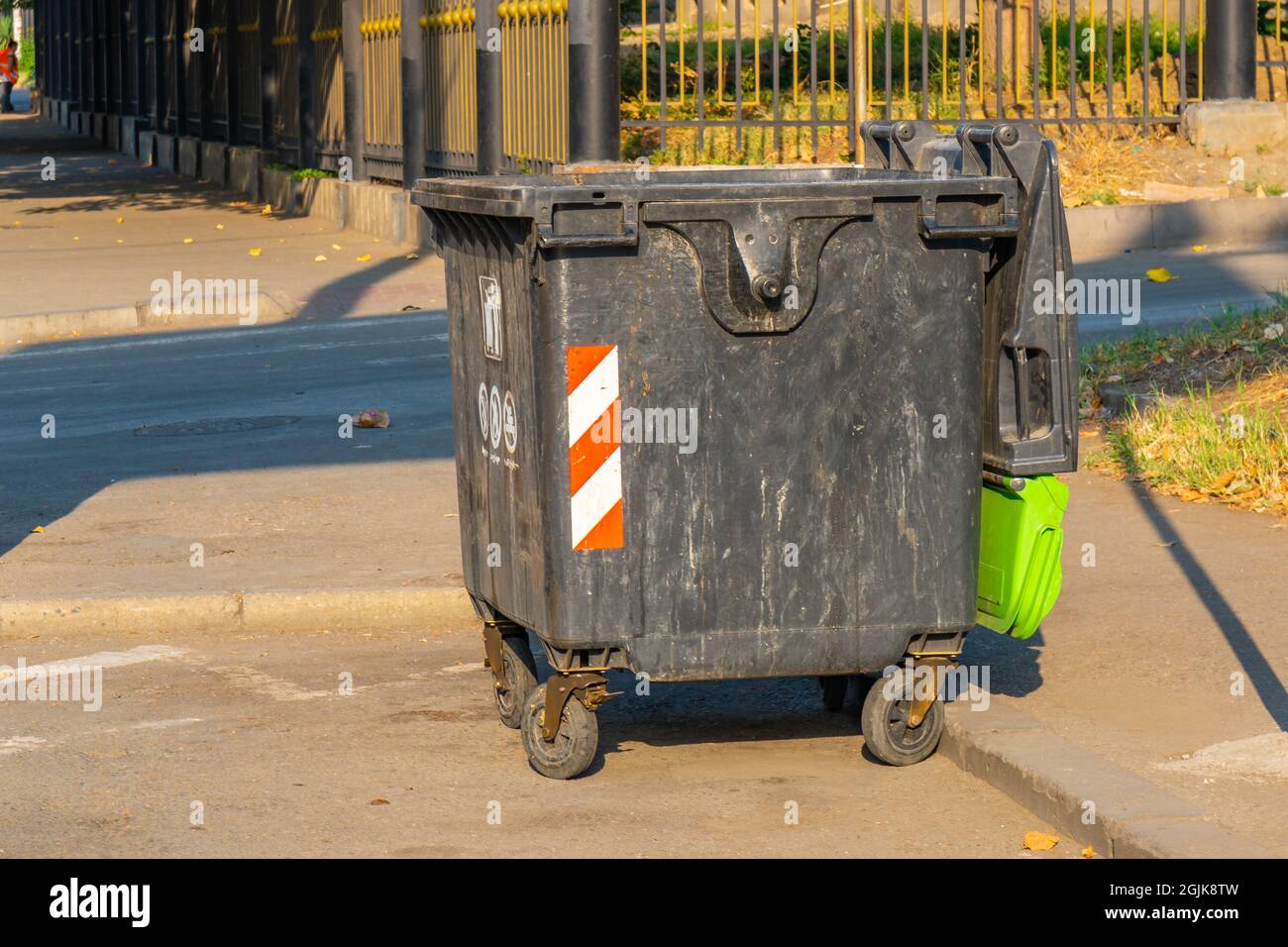 Big black recycling container on the street. Outdoor Stock Photo - Alamy
