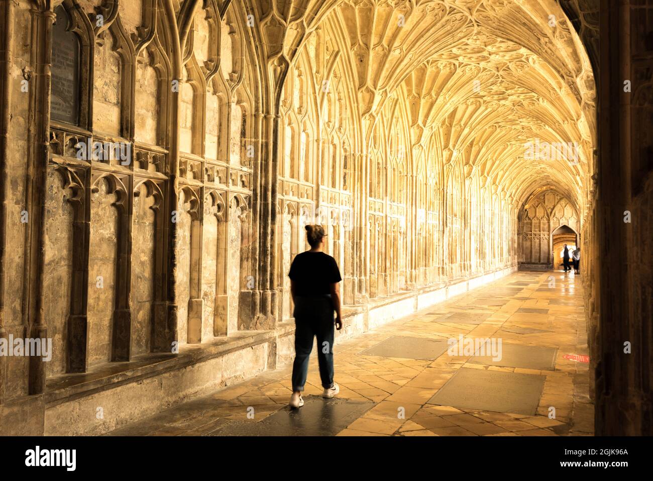Walking in the cloister of Gloucester Cathedral, Gloucester, United ...