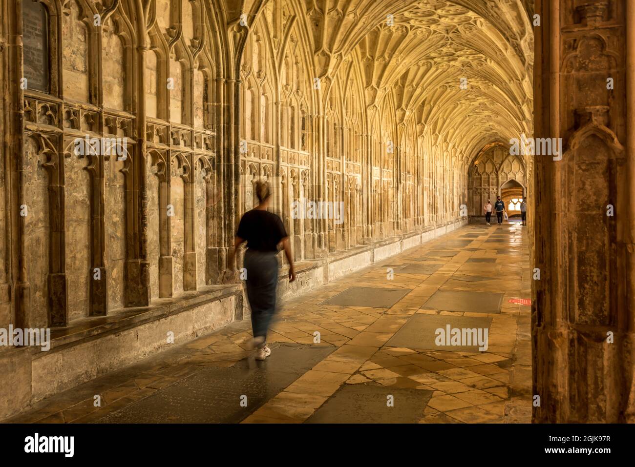 Walking in the cloister of Gloucester Cathedral, Gloucester, United ...