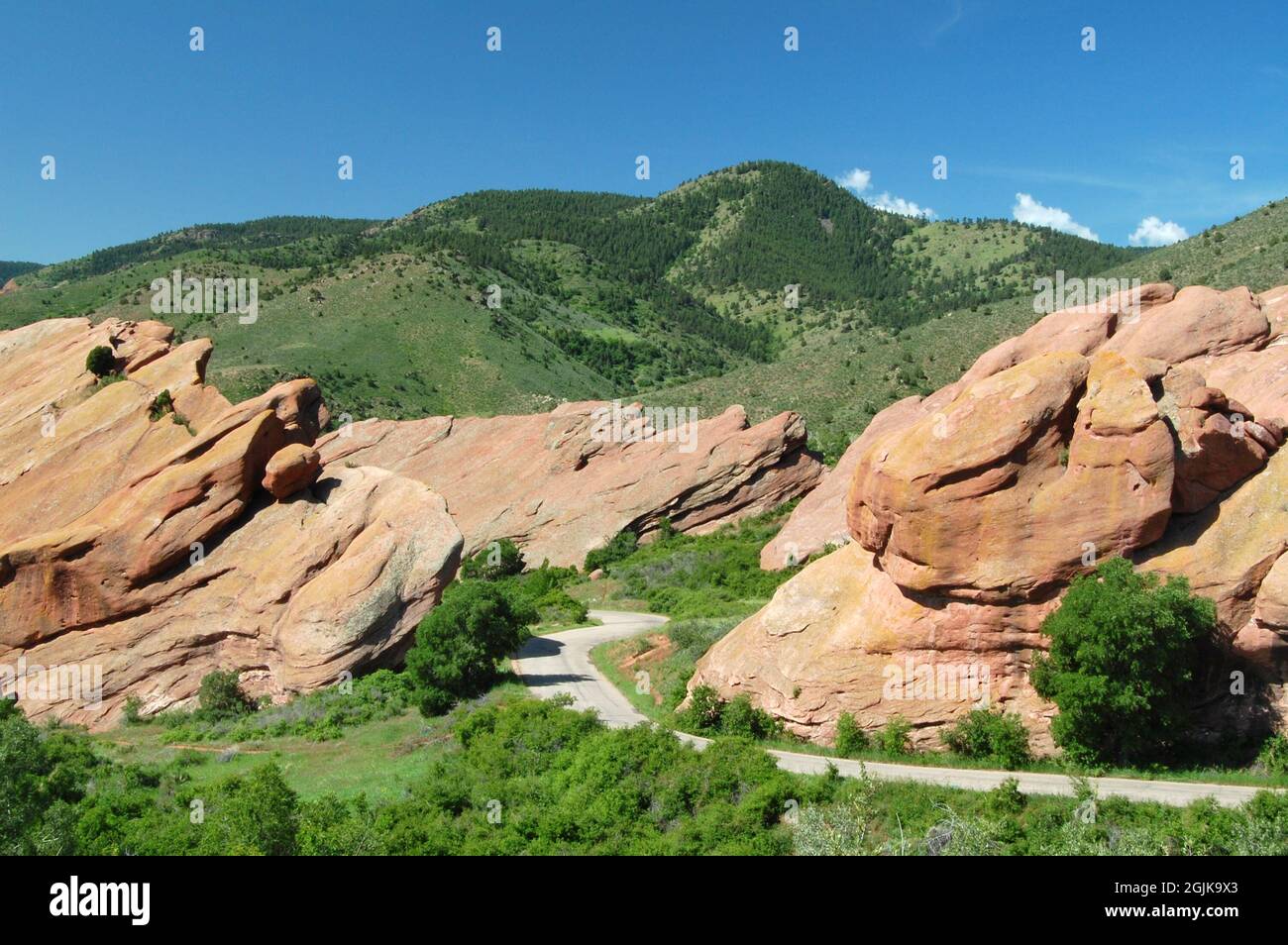 Colorado summer landscape at Red Rocks Park with road between sandstone ...