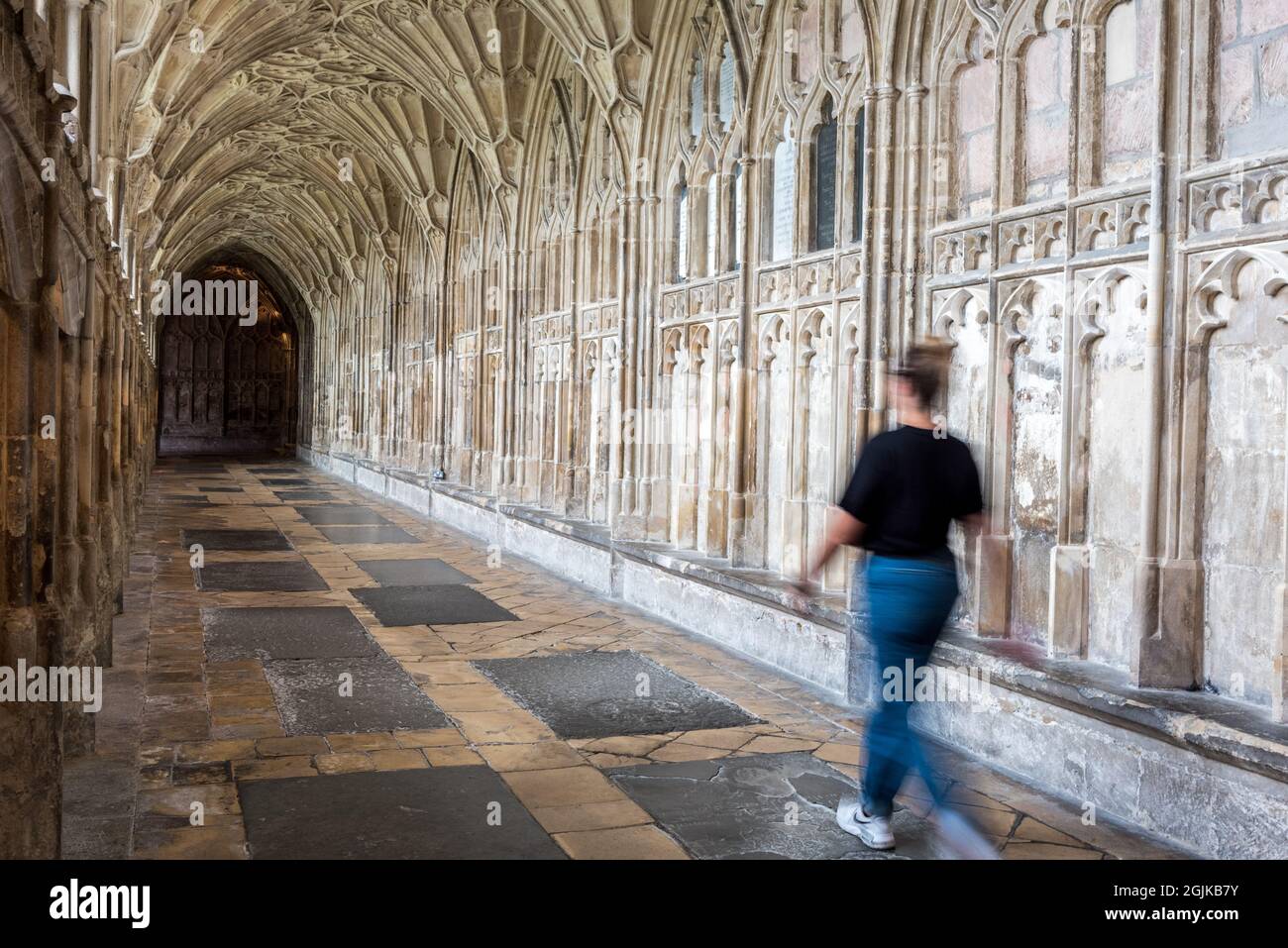 Walking in the cloister of Gloucester Cathedral, Gloucester, United ...