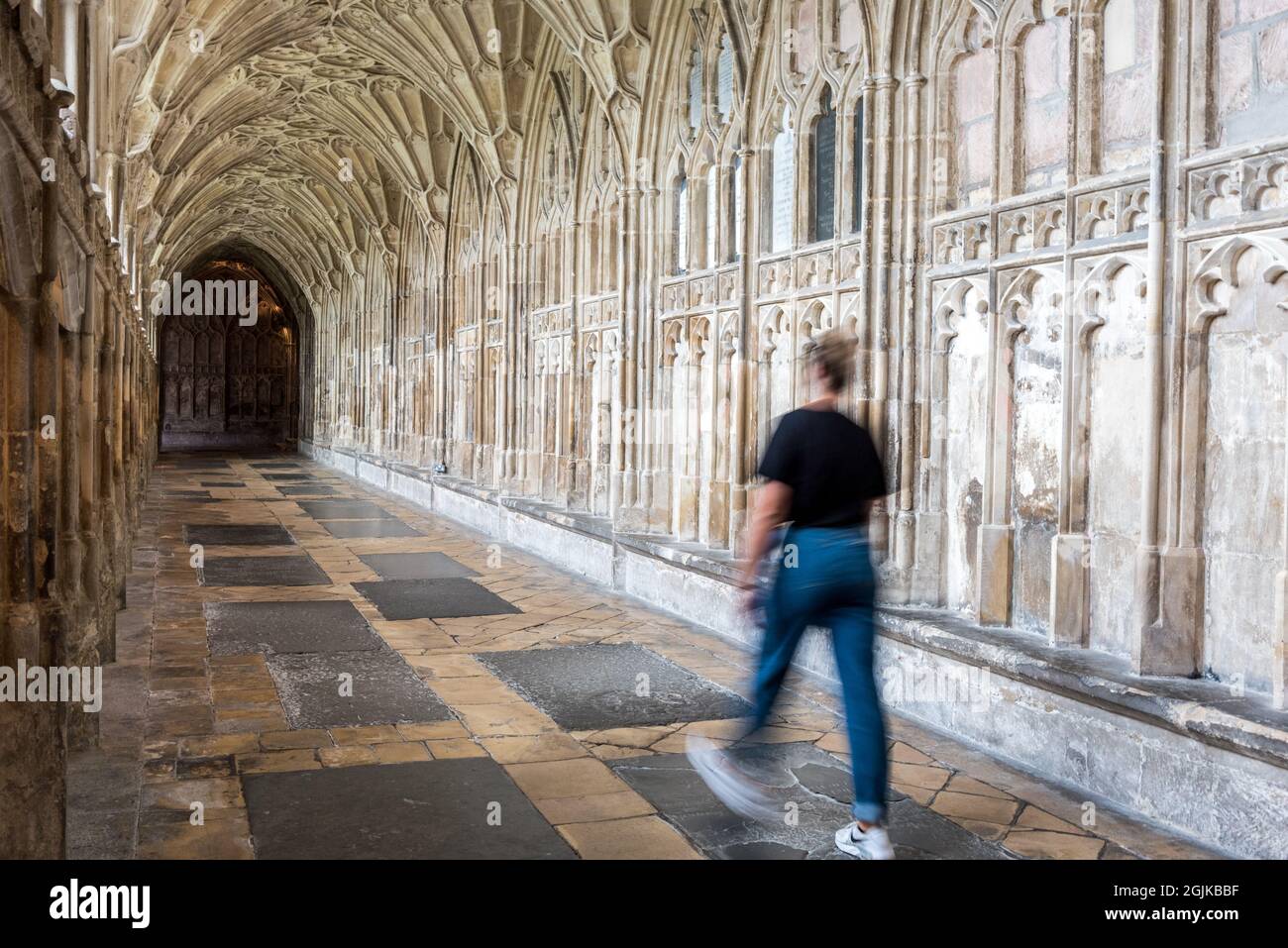 Walking in the cloister of Gloucester Cathedral, Gloucester, United ...