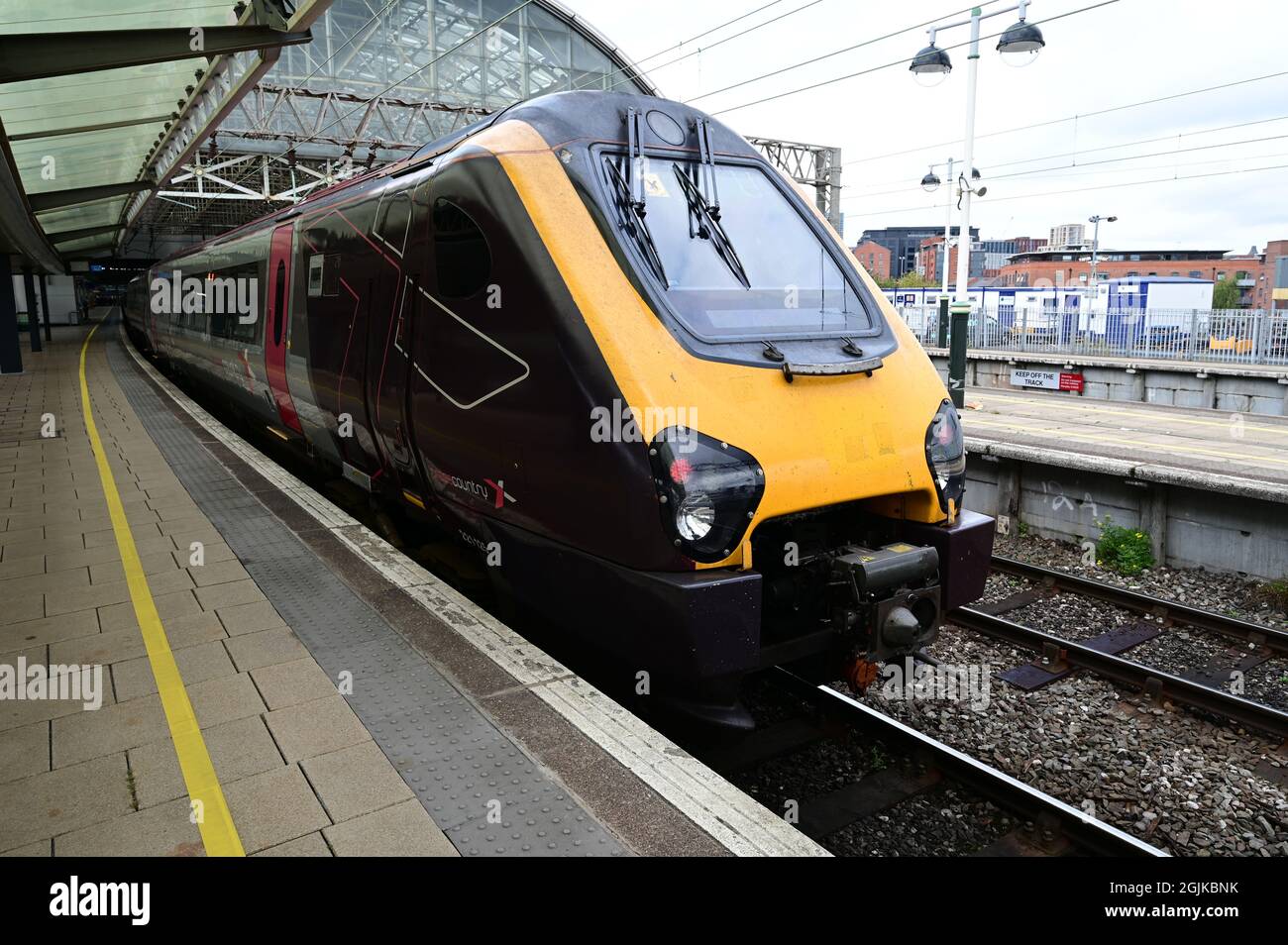 Passenger train inside Manchester Piccadilly station Stock Photo - Alamy