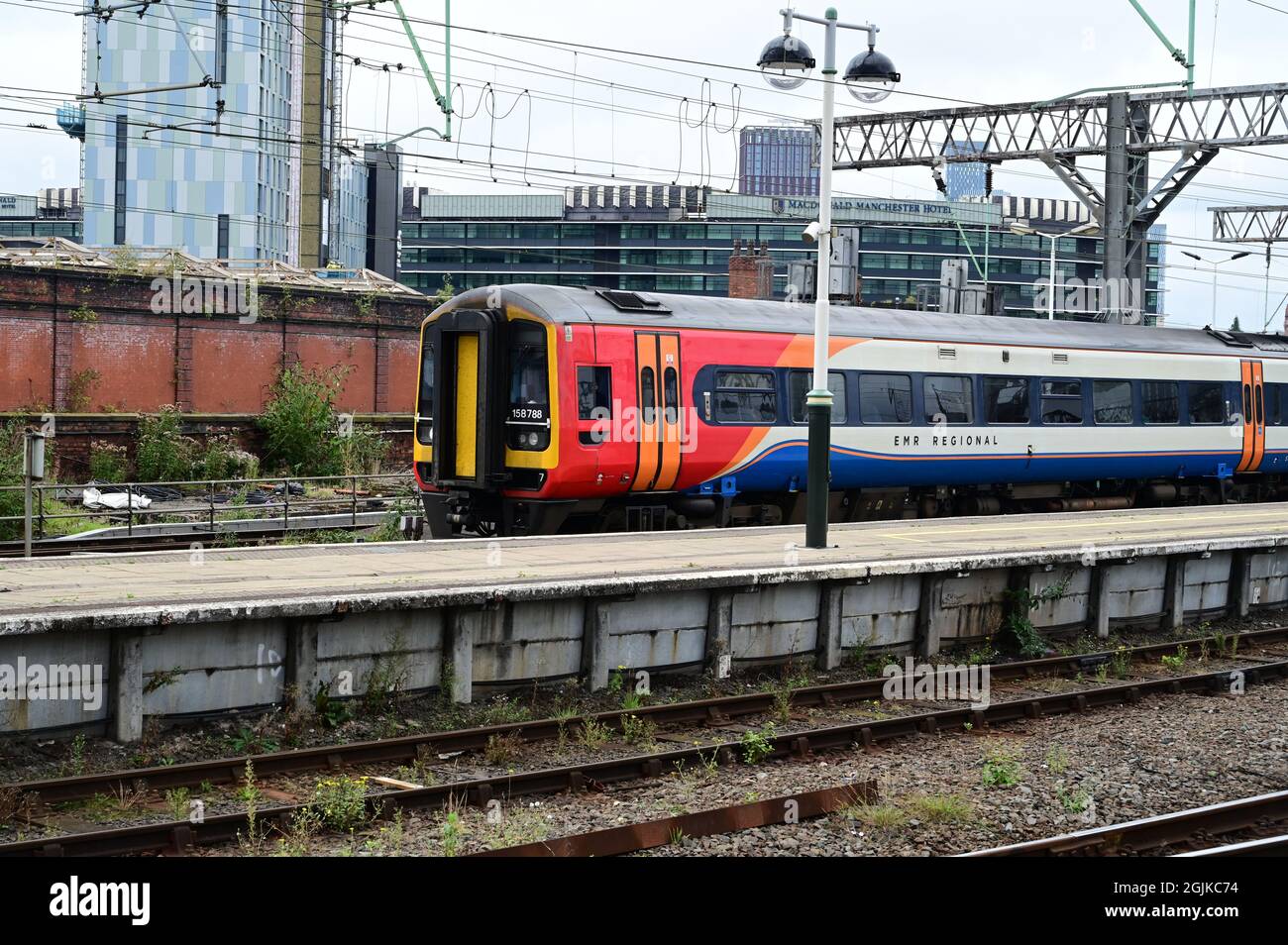 A class 158 EMR regional leaving Manchester Piccadilly station Stock ...