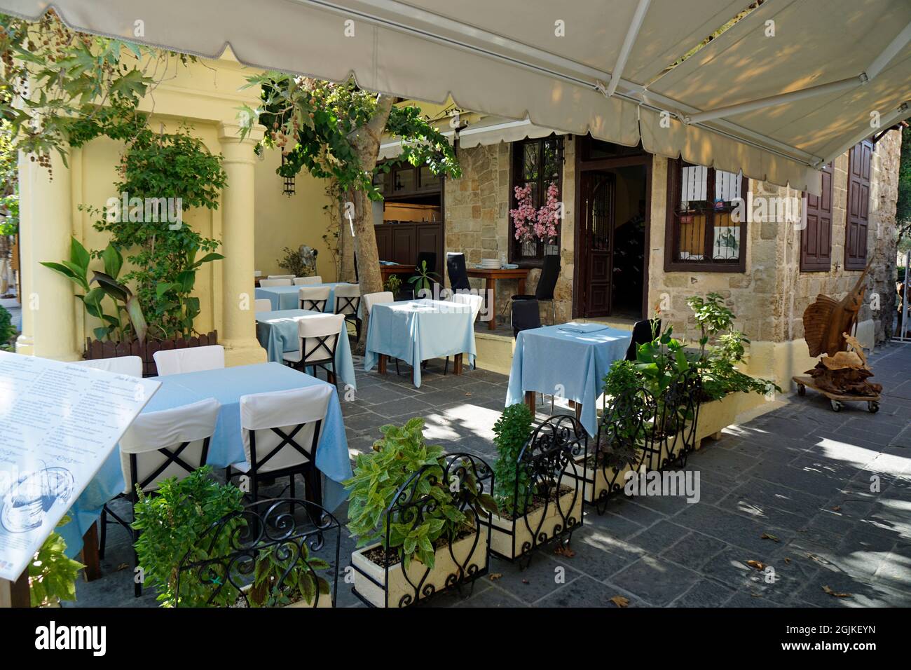 traditional greek taverna restaurant on rhodes island Stock Photo - Alamy