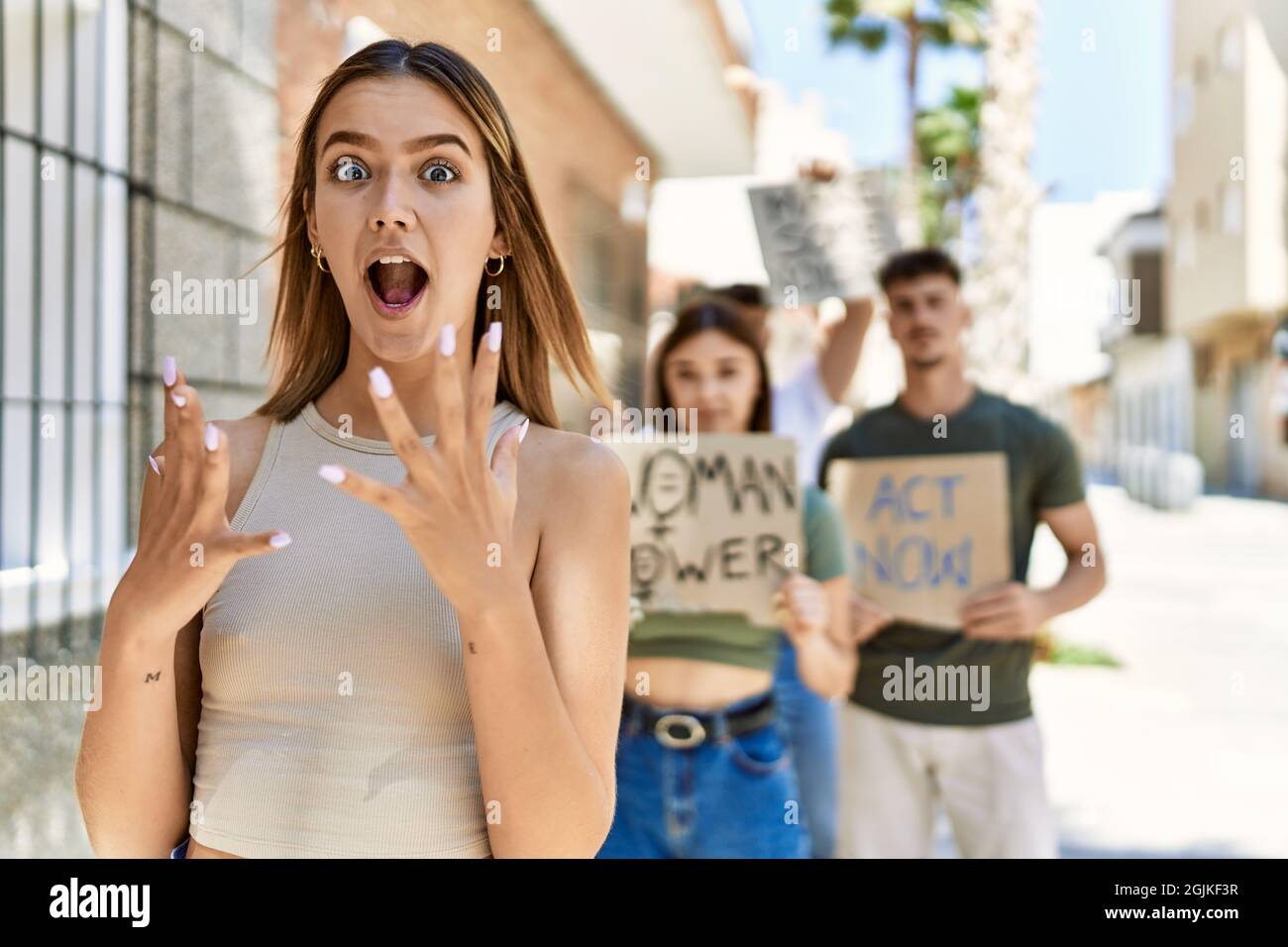 Group of people protesting and giving slogans at the street celebrating ...