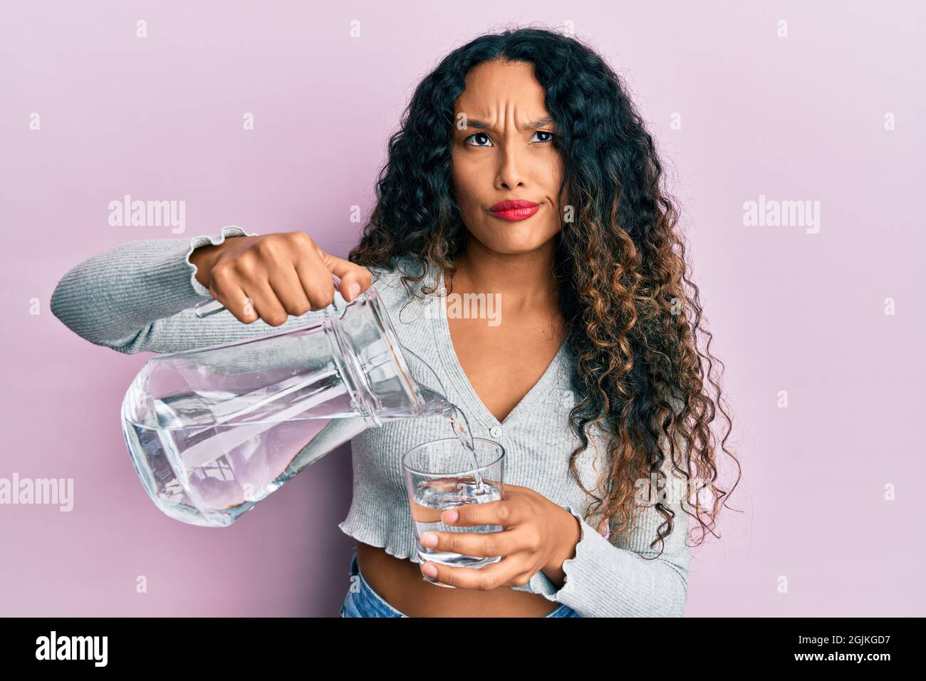 Female water pouring on head hi-res stock photography and images - Alamy