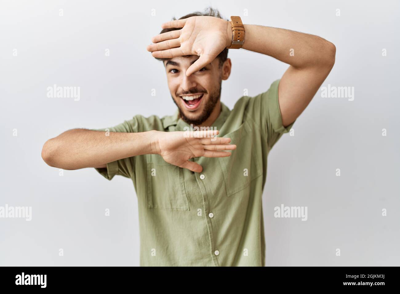 Young arab doctor man standing over isolated background smiling ...