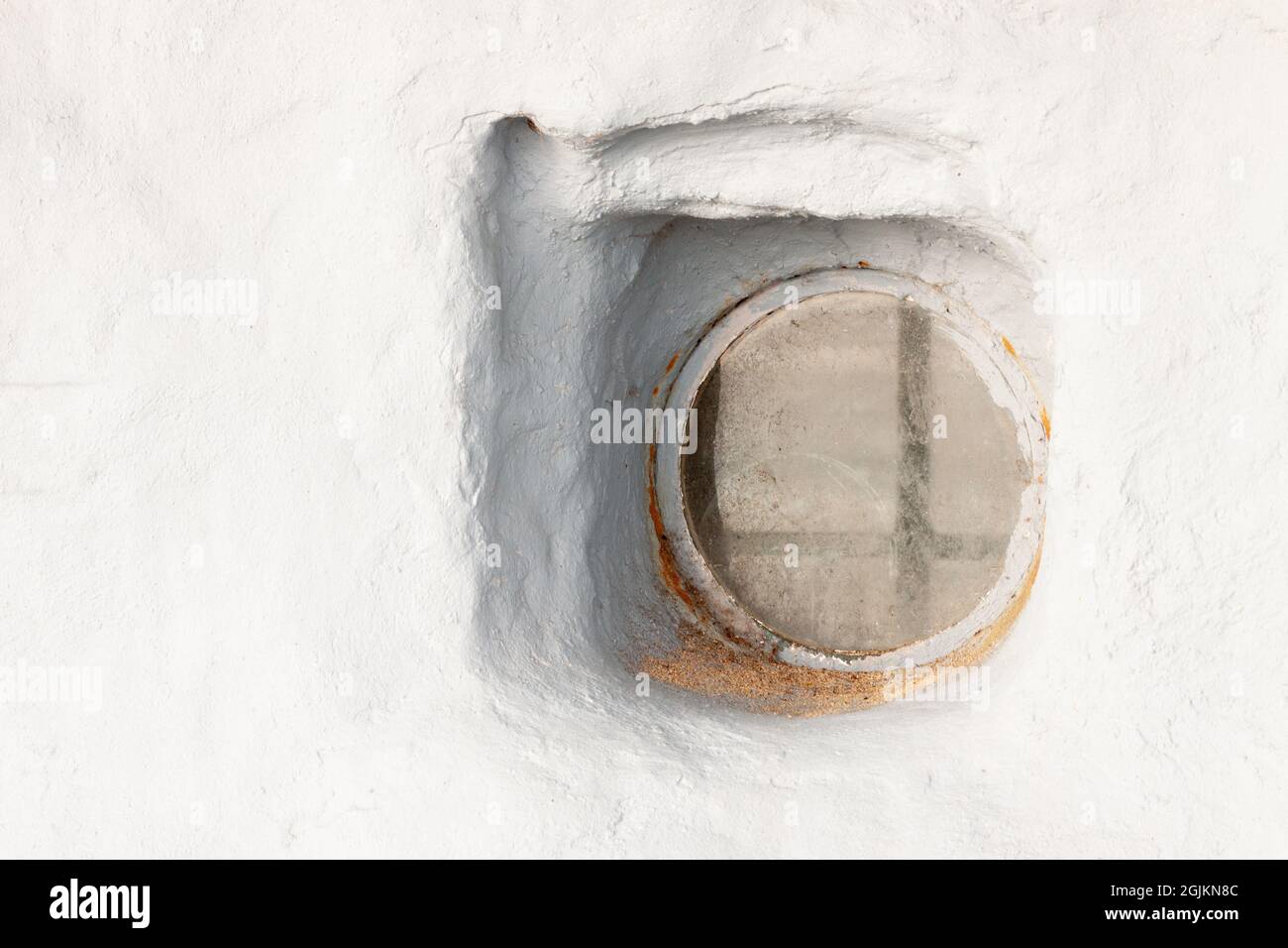 Round porthole style window in seafront building St. Ives Cornwall ...