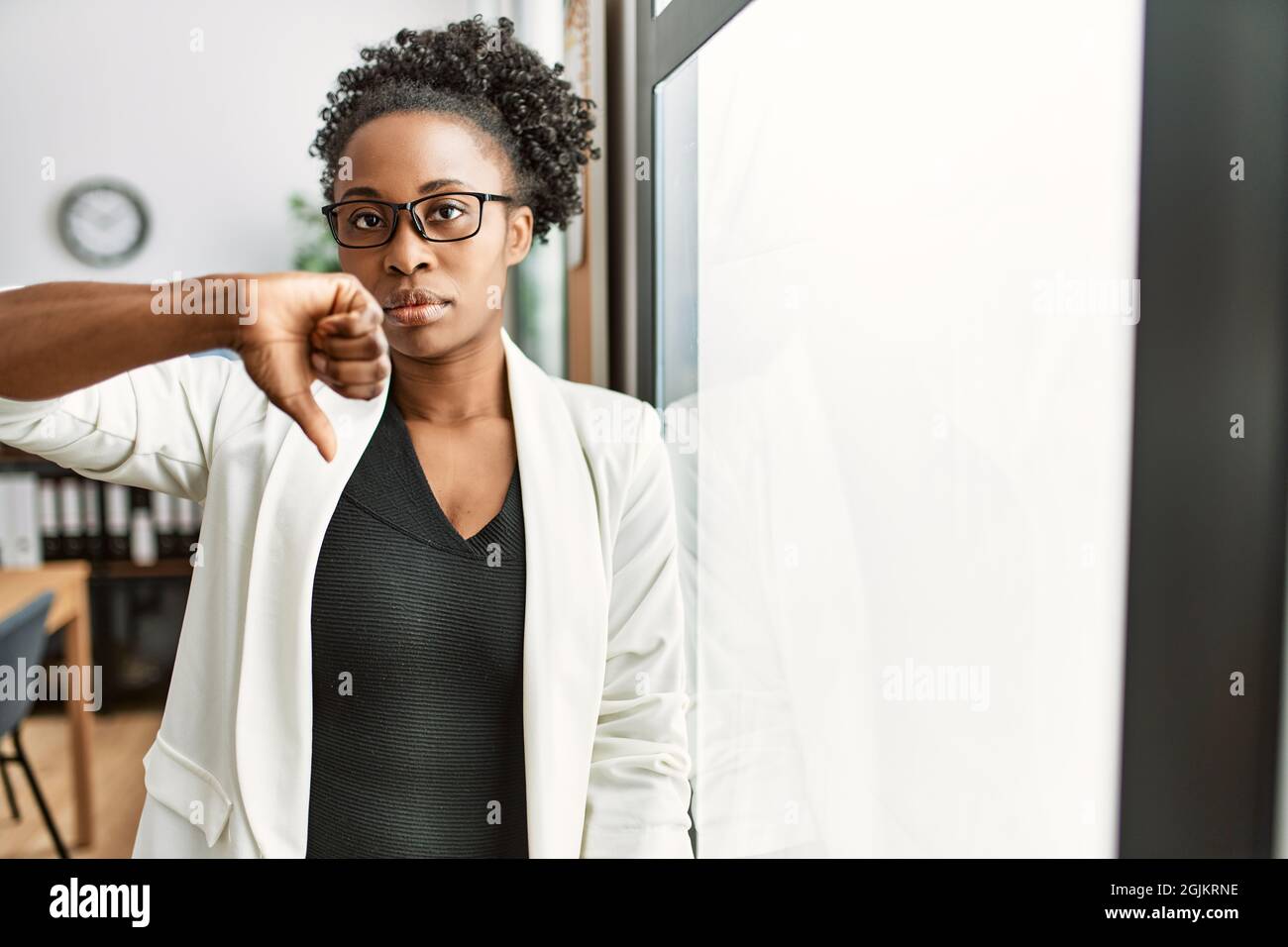 African business woman working at the office with angry face, negative ...