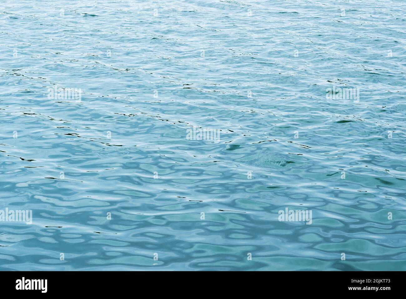 Beautiful ripples on the blue water surface. Natural background Stock ...