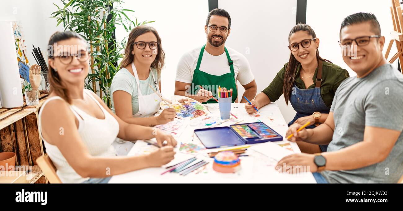 Group of draw students sitting on the table drawing at art studio Stock ...