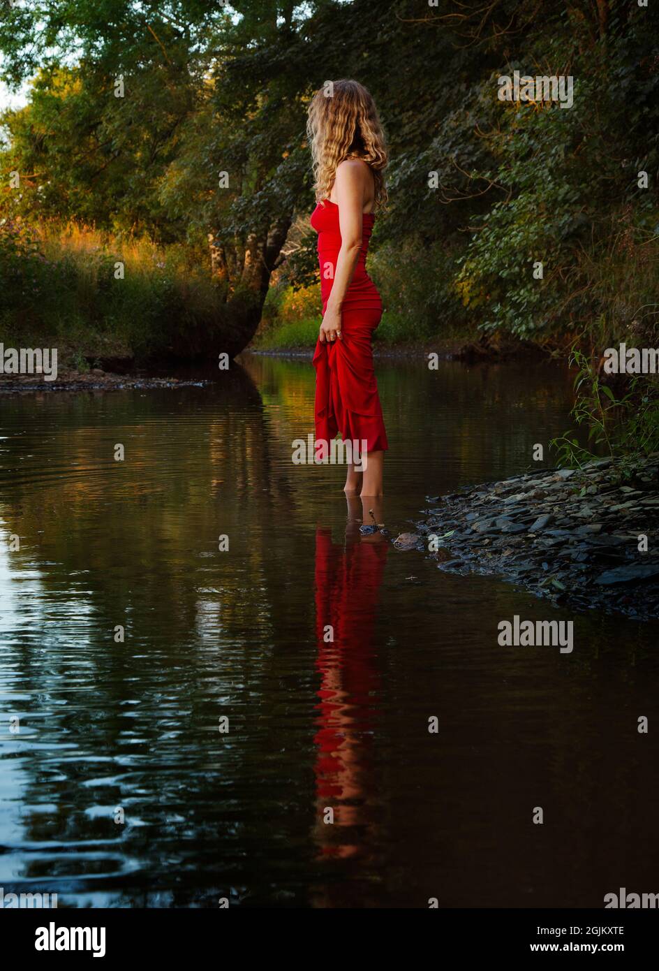 Woman in river water hi-res stock photography and images - Alamy