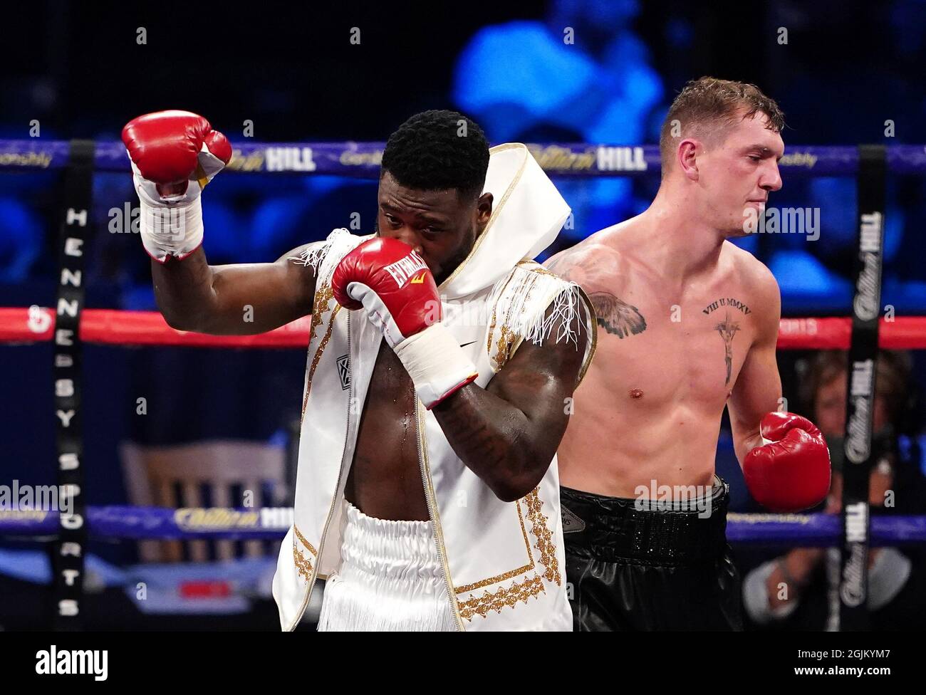 Isaac Chamberlain (left) celebrates victory after Ben Thomas retires ...