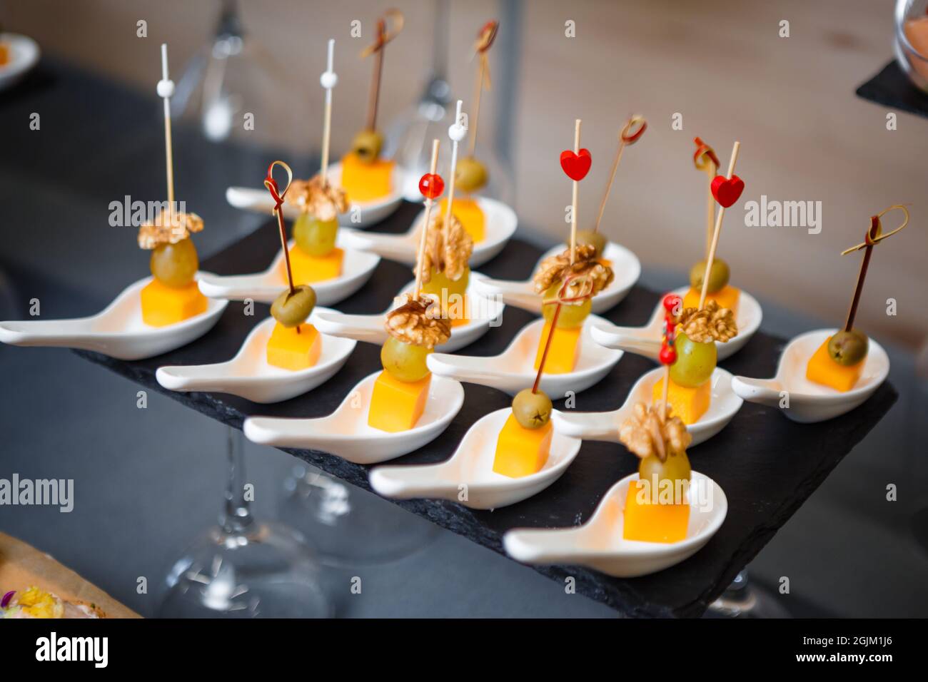 Catering service. Snacks for guests on the table Stock Photo - Alamy
