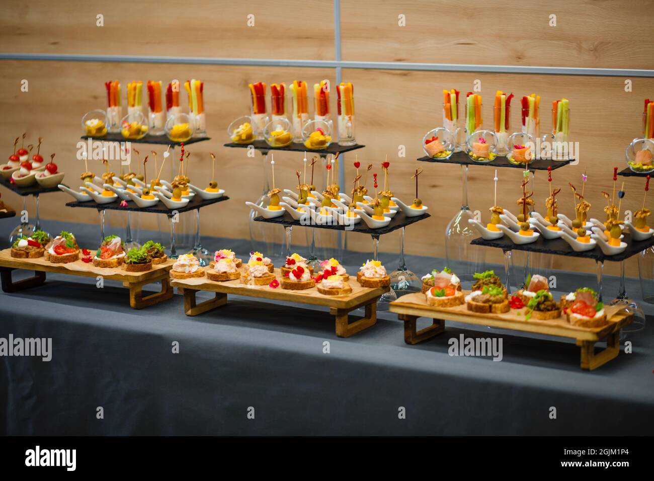 Catering service. Snacks for guests on the table Stock Photo - Alamy