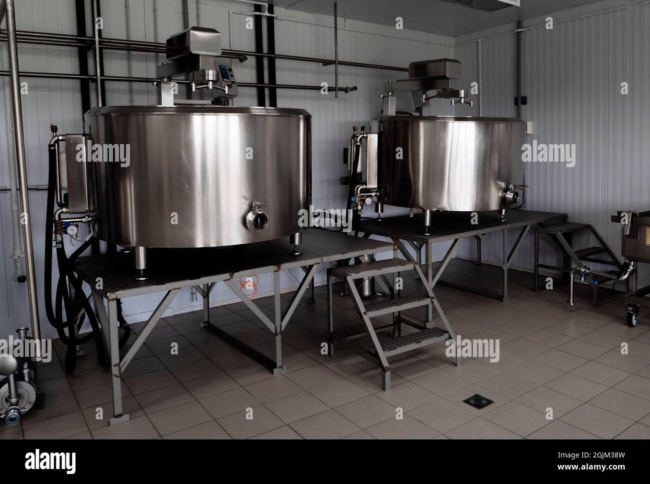 Interior of cheese factory with fermentation tank. Technology equipment ...