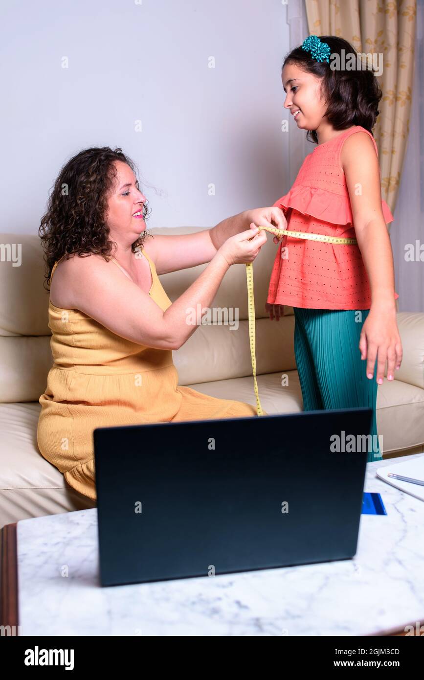 Child waist measuring waist hi-res stock photography and images - Alamy