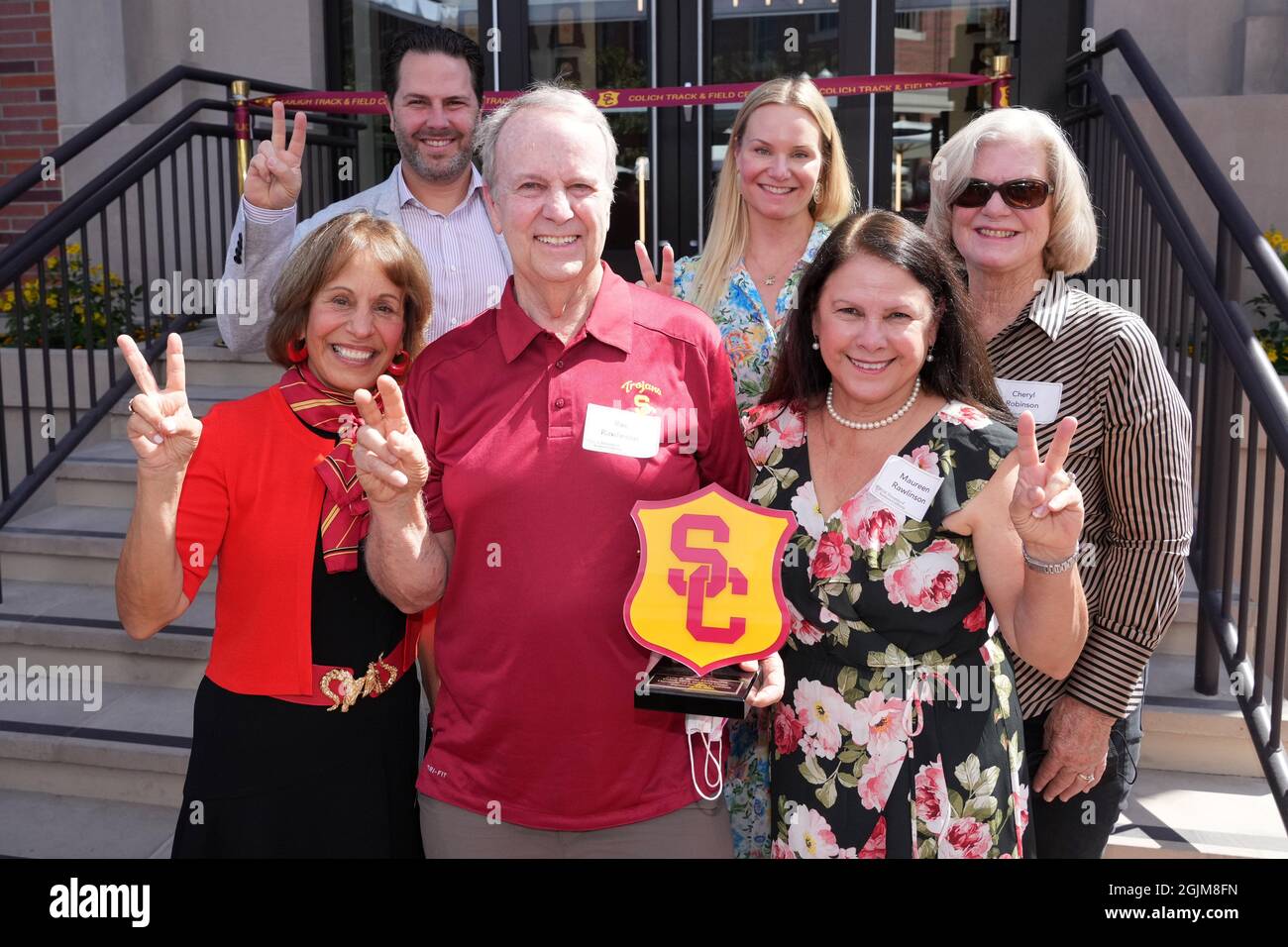 Southern California Trojans president Carol FOlt (left) poes with ...