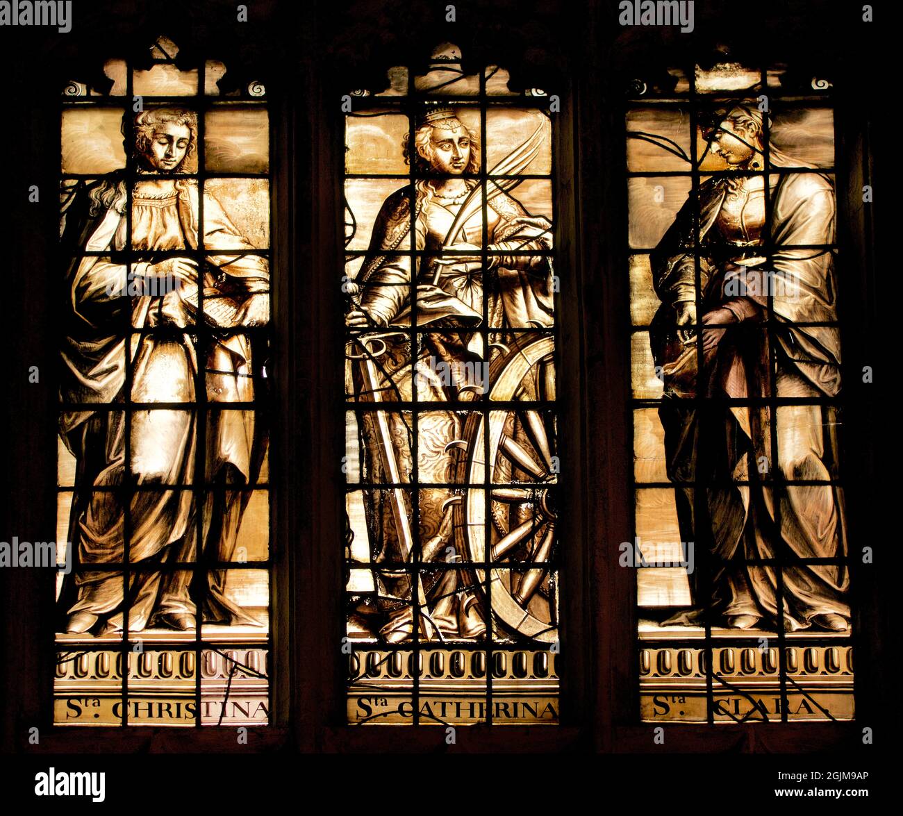 Sepia-toned stained glass of Saints, Magdalen College chapel ...
