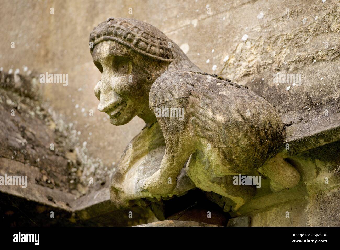 Gargoyle in the cloisters quadrangle of Magdalen College, University of ...