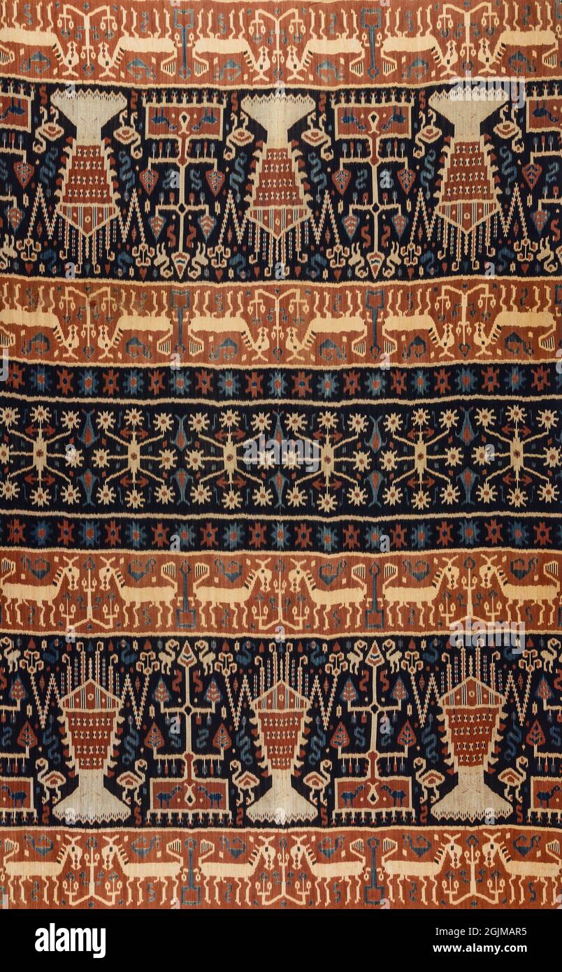 Detail of a hinggi textile shoulder cloth. Warp ikat decorated, Sumba ...