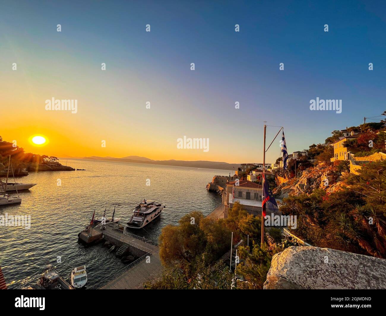 Beautiful sunset colors from the picturesque Hydra island in Greece ...