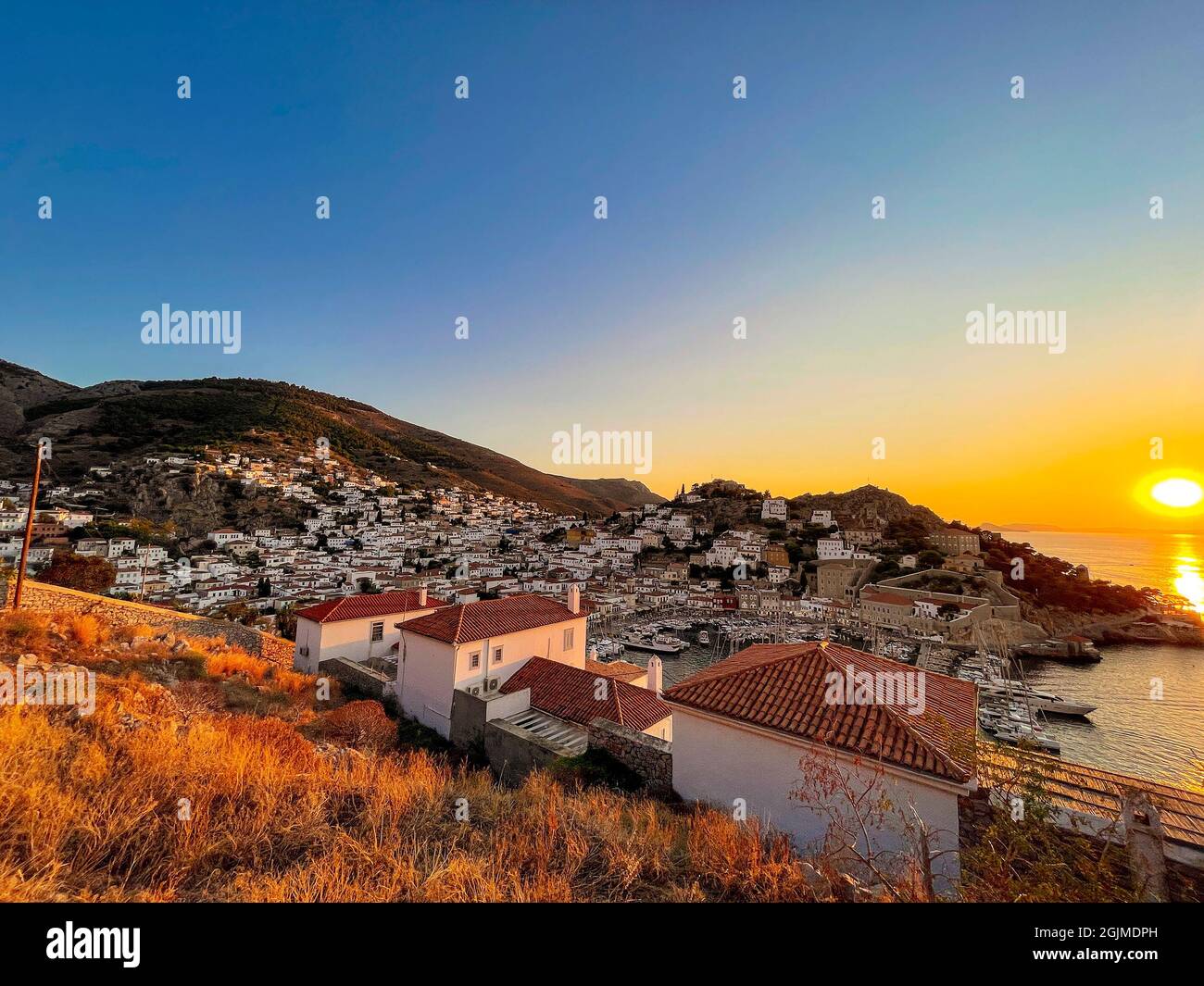 Beautiful sunset colors from the picturesque Hydra island in Greece ...
