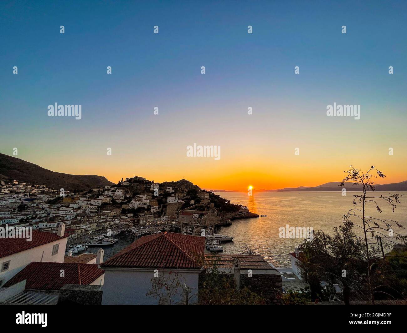 Beautiful sunset colors from the picturesque Hydra island in Greece ...