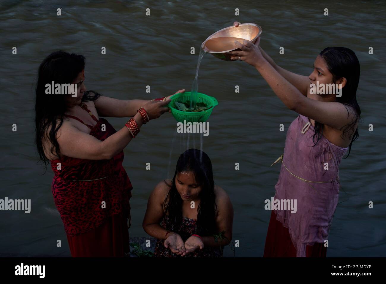 Kathmandu, Nepal. 11th Sep, 2021. Nepalese Hindu women take a ritual ...