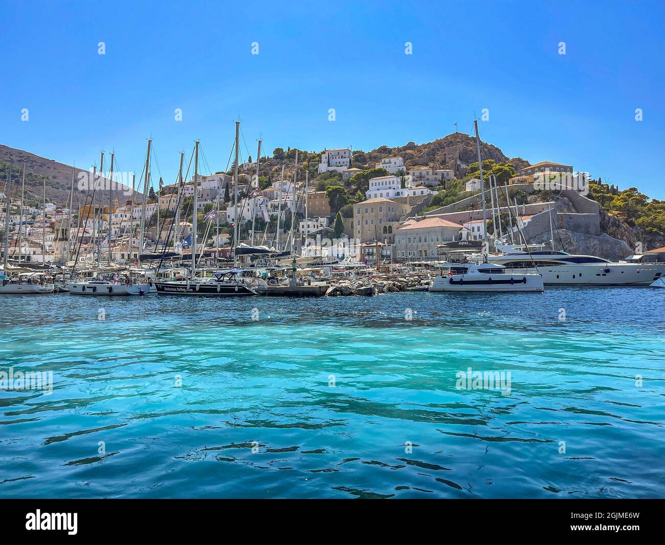 View from the picturesque port of Hydra island. The harbor or port as ...