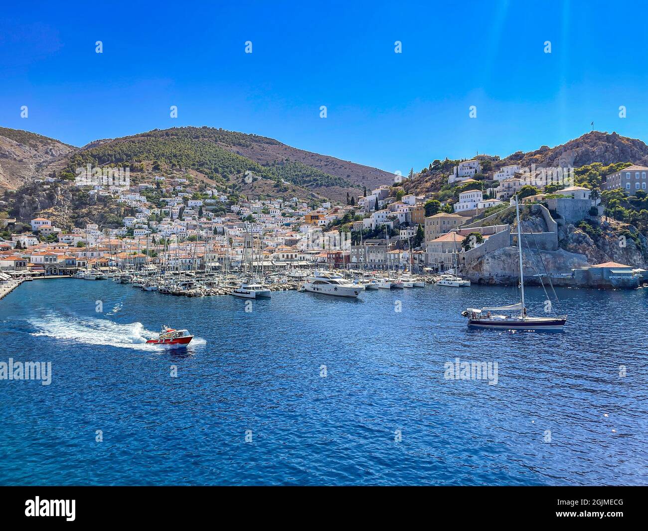 View from the picturesque port of Hydra island. The harbor or port as ...