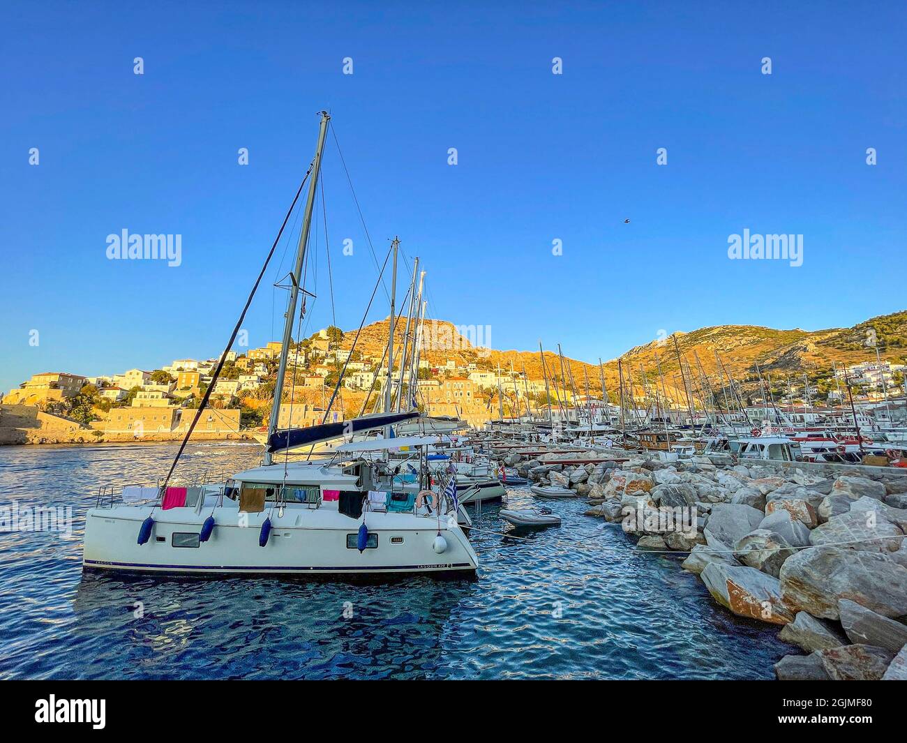 View from the picturesque port of Hydra island. The harbor or port as ...